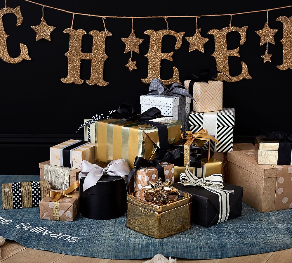 The Emily & Meritt Denim Tassel Tree Skirt | Pottery Barn