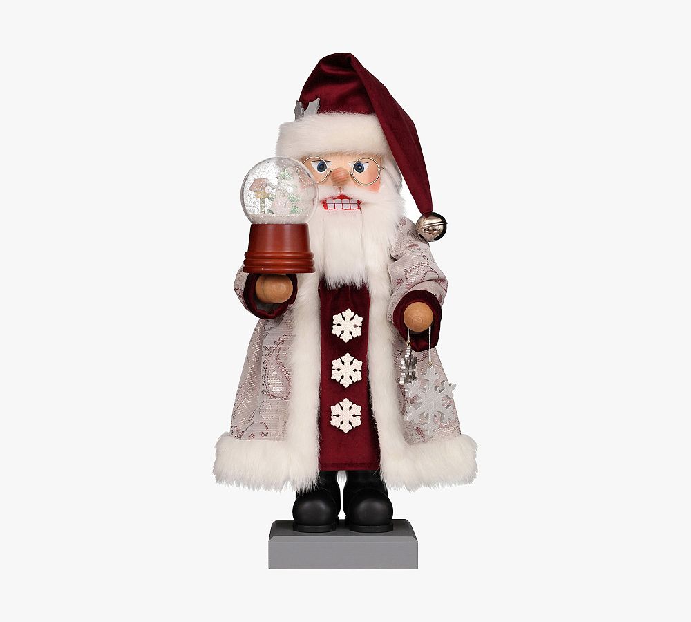 Father Christmas With Snowglobe Nutcracker | Pottery Barn