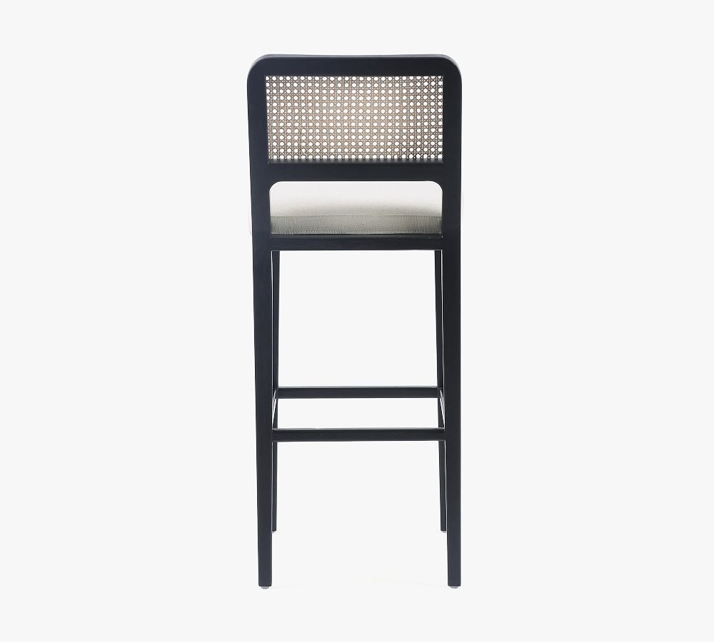 Lisbon Upholstered Cane Narrow Bar & Counter Stools | Pottery Barn