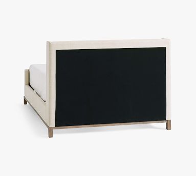 Jake Upholstered Platform Sleigh Bed with Wood Base | Pottery Barn